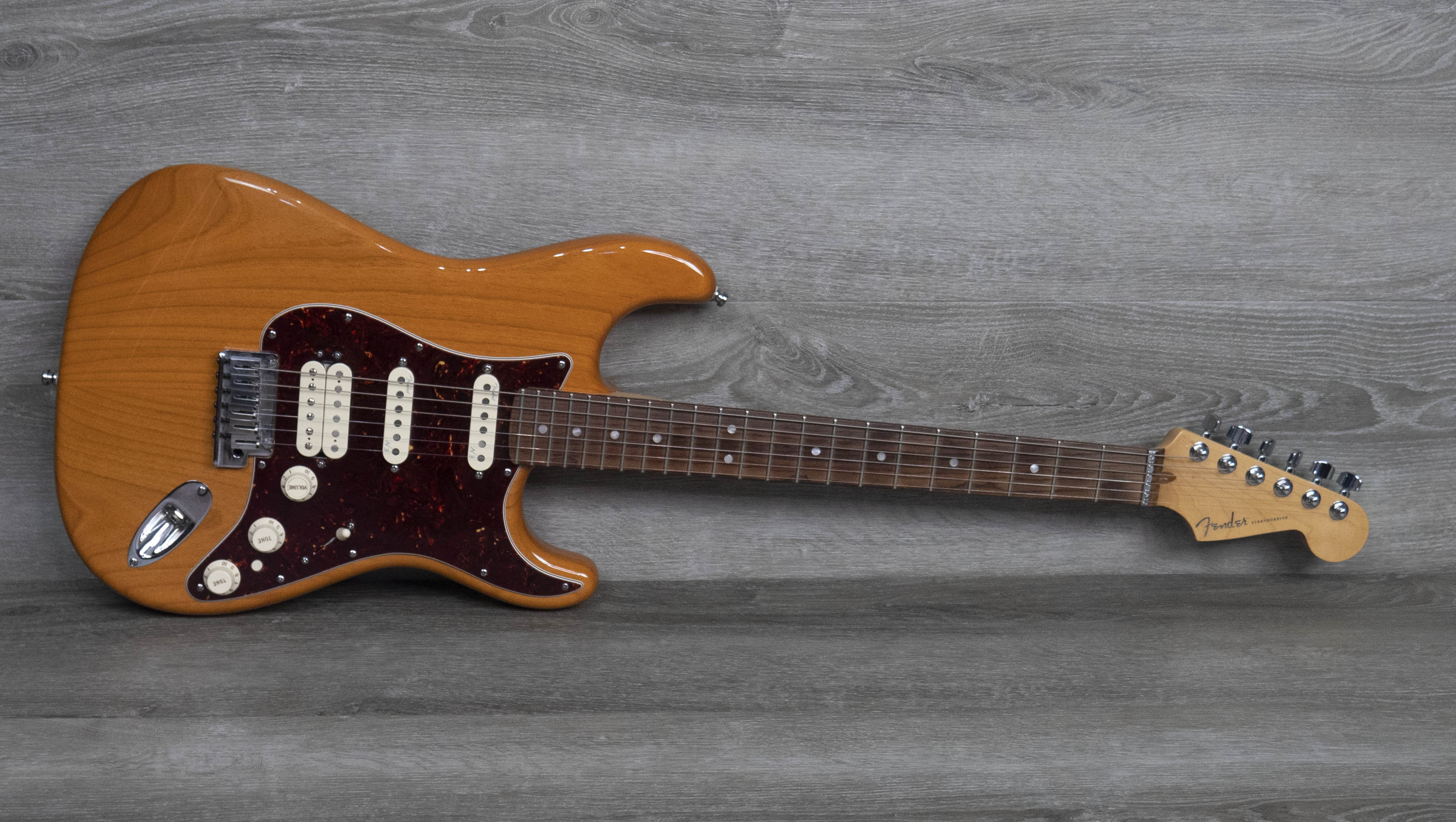 Pre-Owned Fender American Deluxe HSS Stratocaster, Amber – A Strings